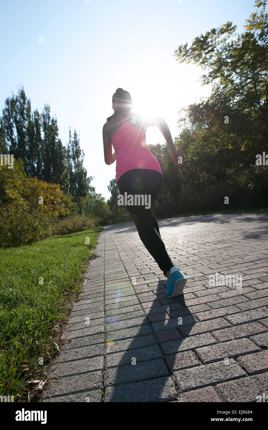 Woman jogging low angle hi-res stock photography and images - Alamy