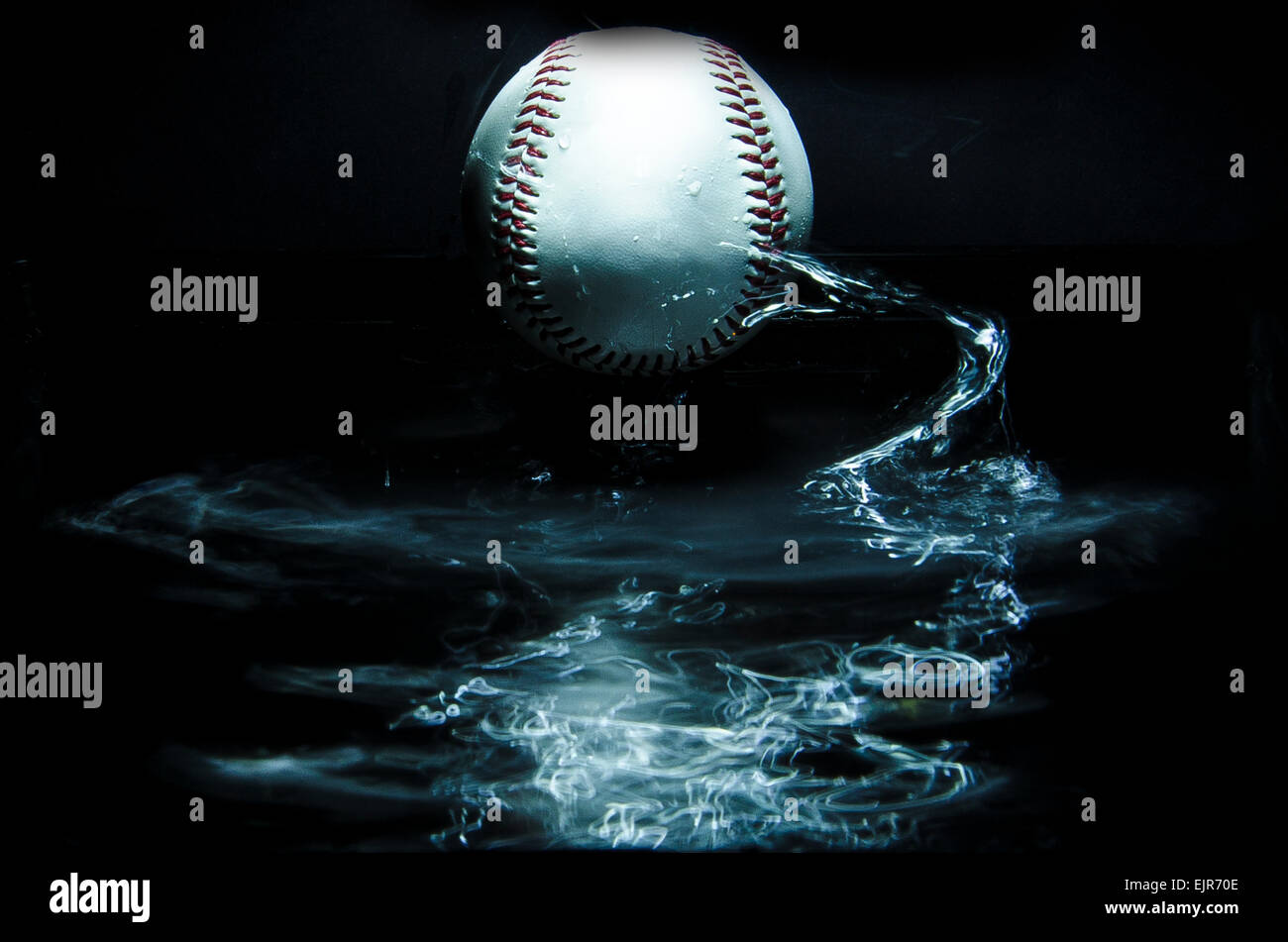 Baseball over water both light painted Stock Photo - Alamy
