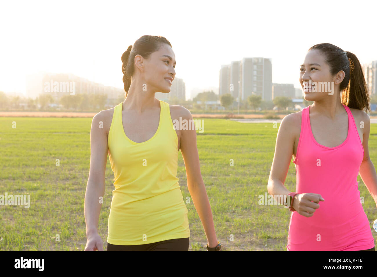Girlfriends exercising together Stock Photo - Alamy