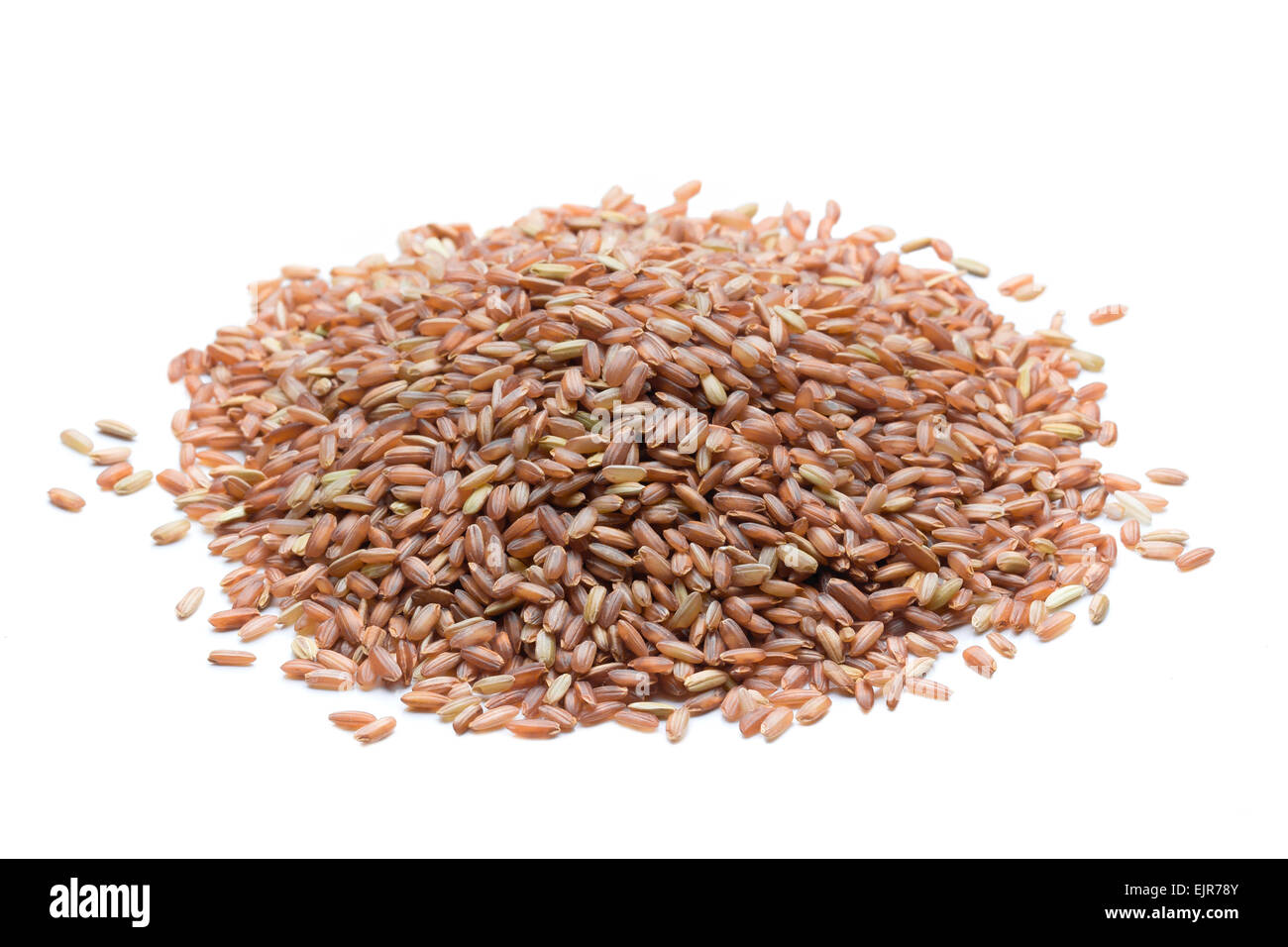 pile of brown rice isolated on white background Stock Photo - Alamy