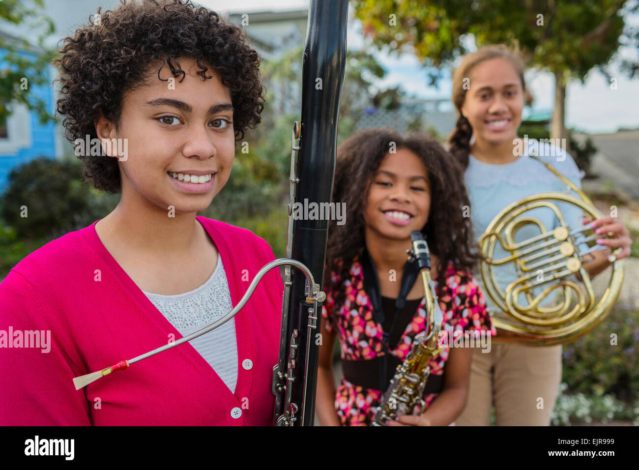 Pacific Islander girls holding musical instruments Stock Photo - Alamy
