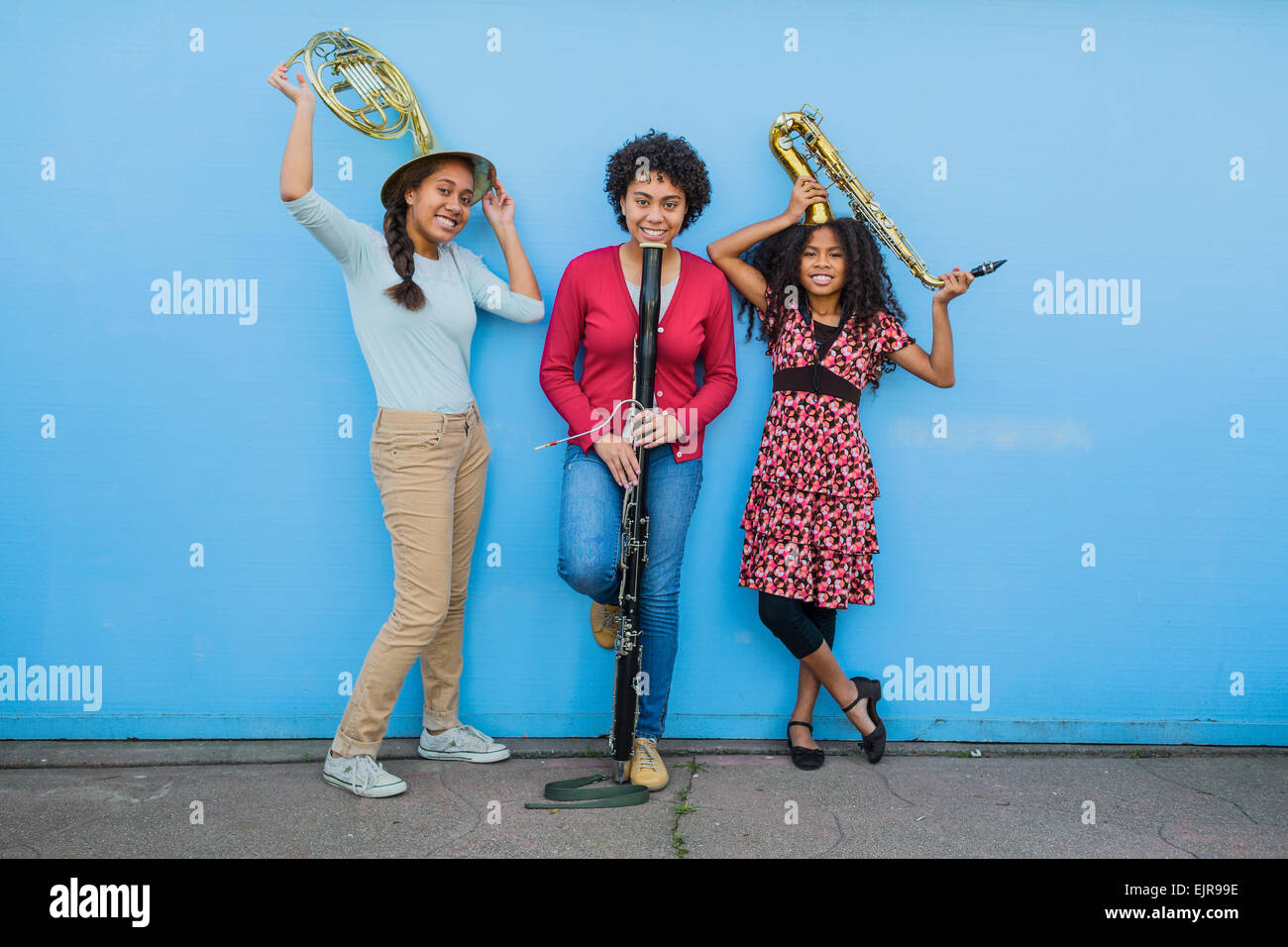 Pacific Islander girls holding musical instruments Stock Photo - Alamy