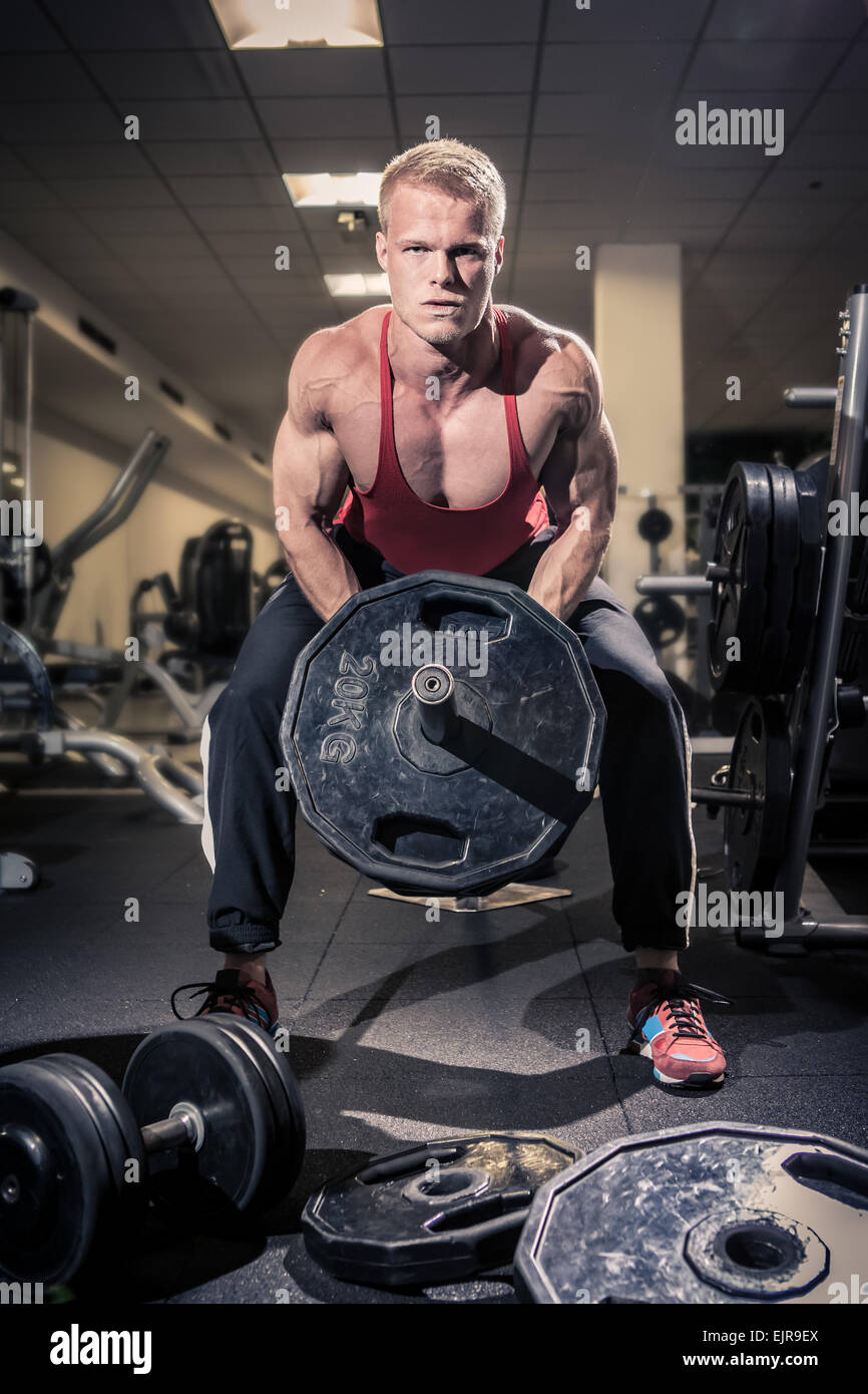 young man at workout in a gym Stock Photo - Alamy