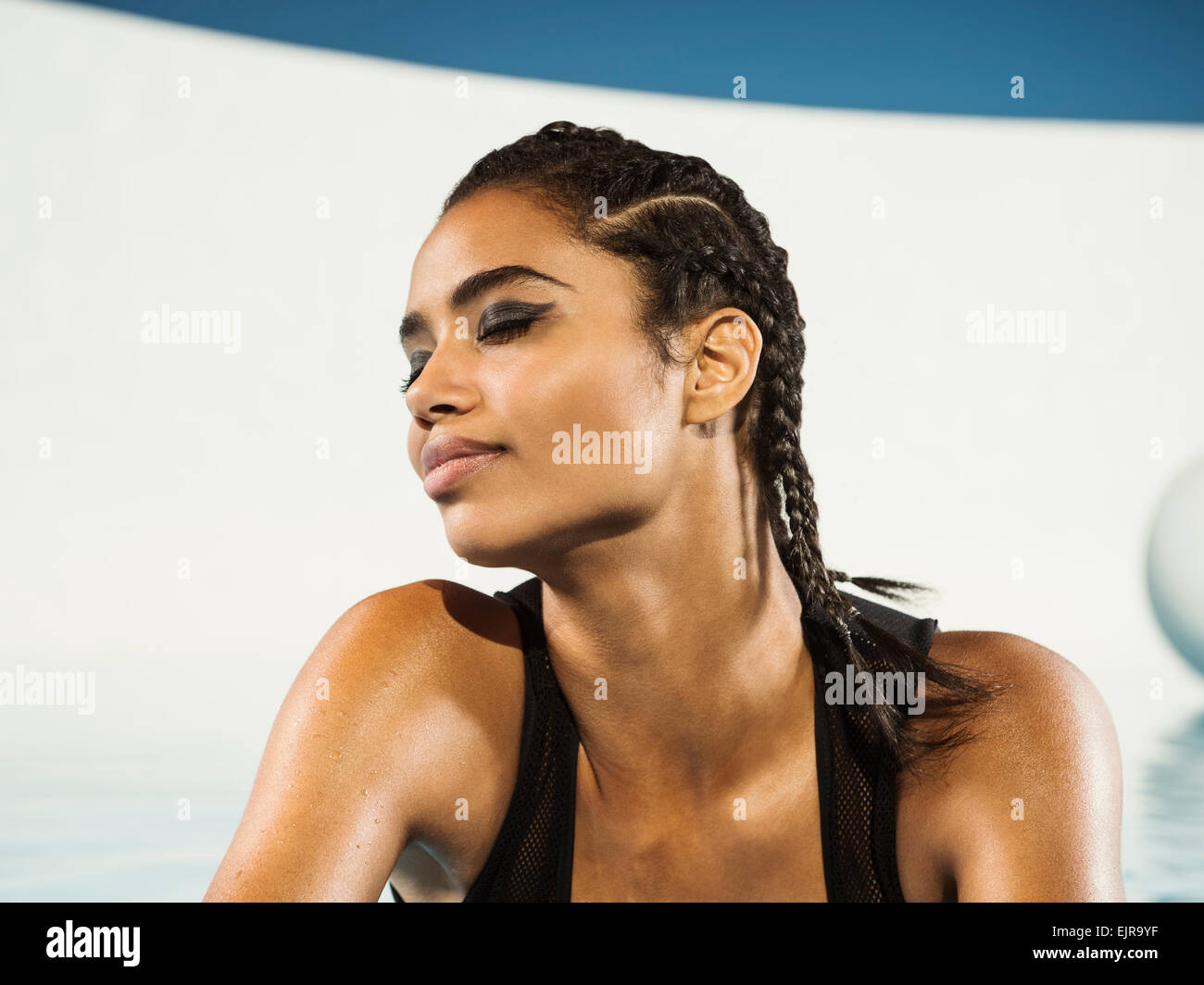 Smiling african woman braided hi-res stock photography and images - Alamy
