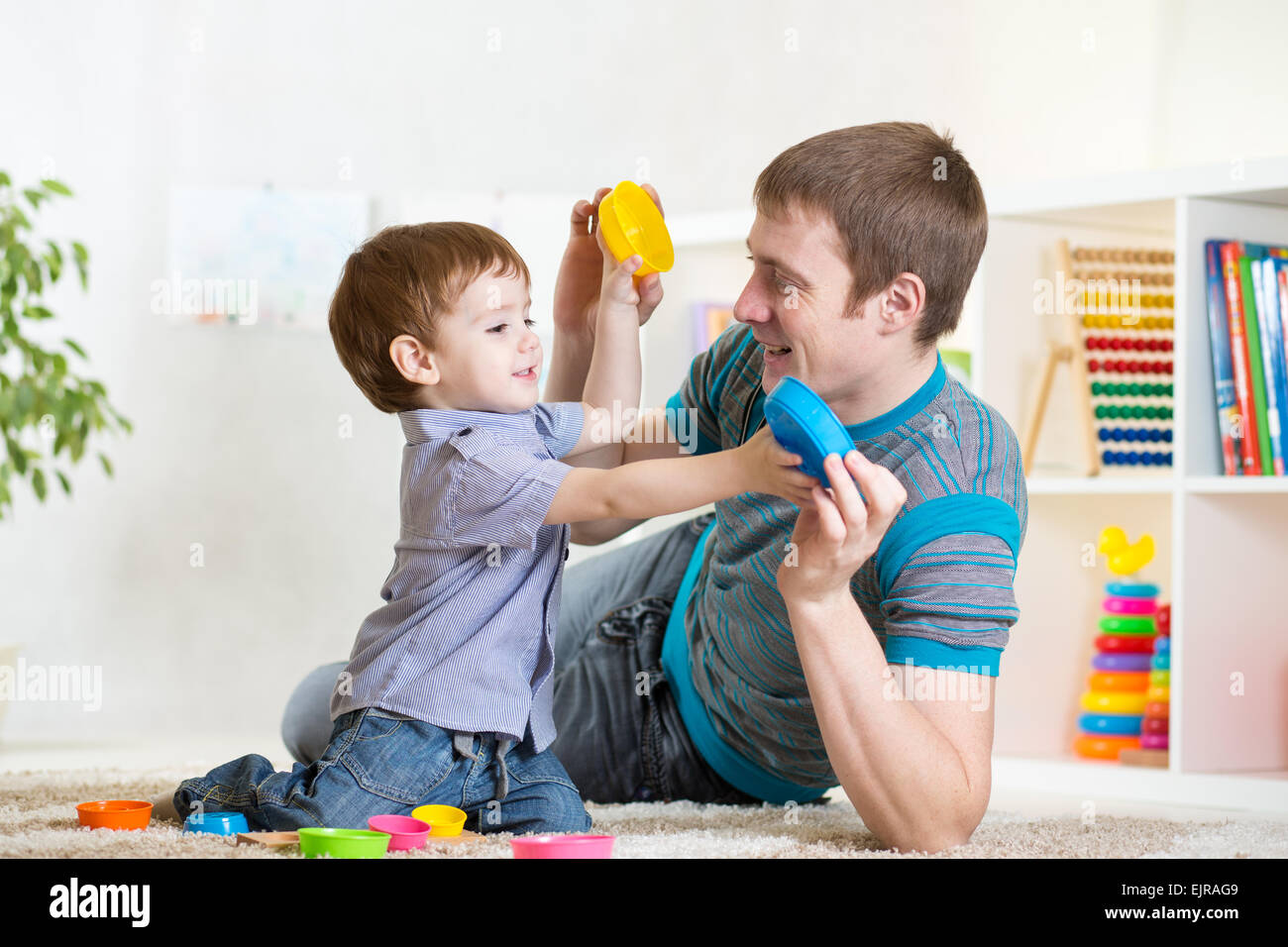 father with kid boy play Stock Photo - Alamy