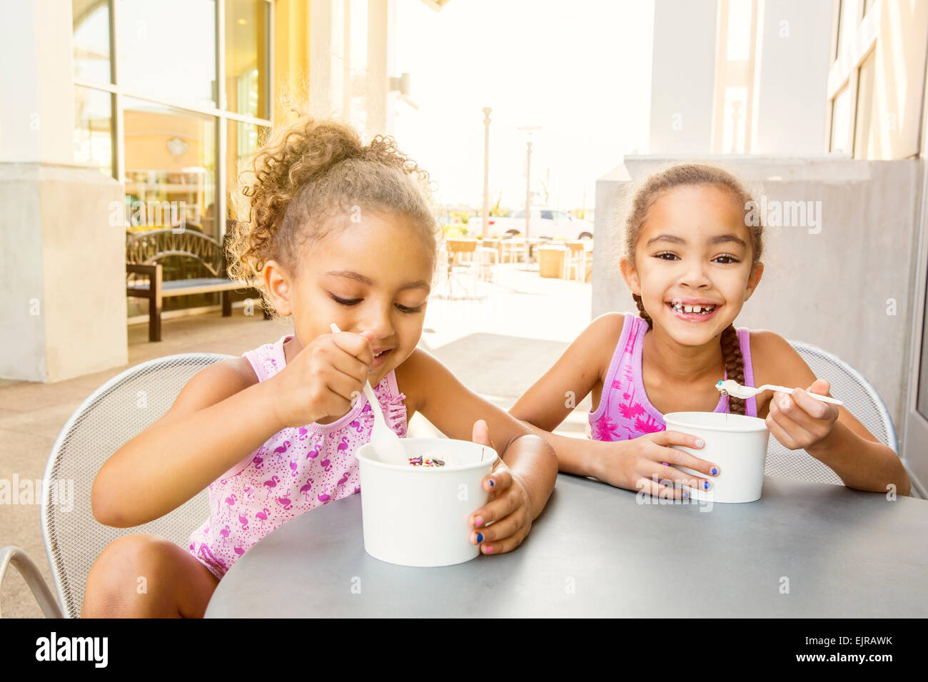 Three girls eating ice cream hi-res stock photography and images - Alamy