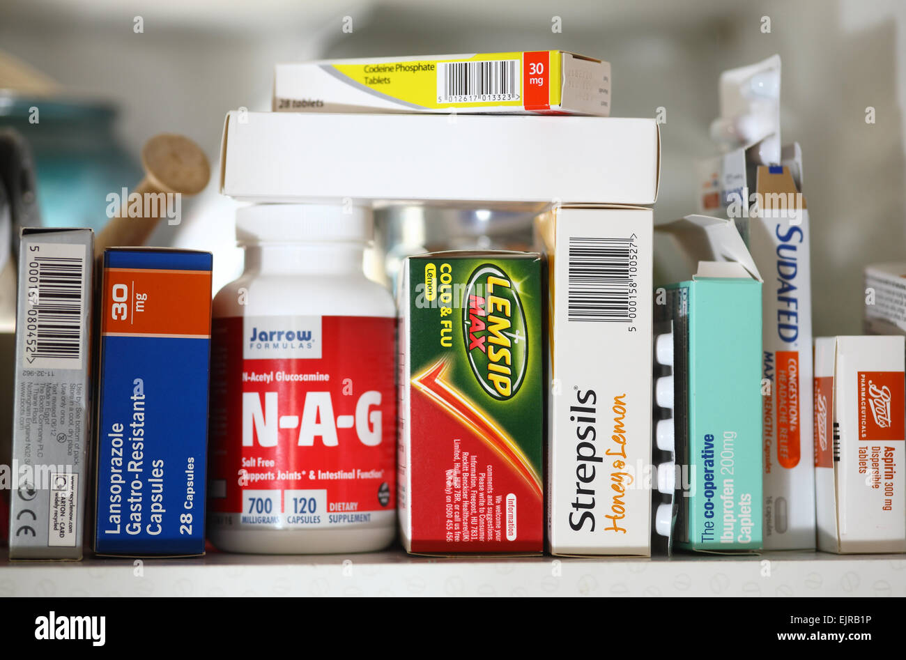 assortment of drugs in domestic cupboard Stock Photo - Alamy