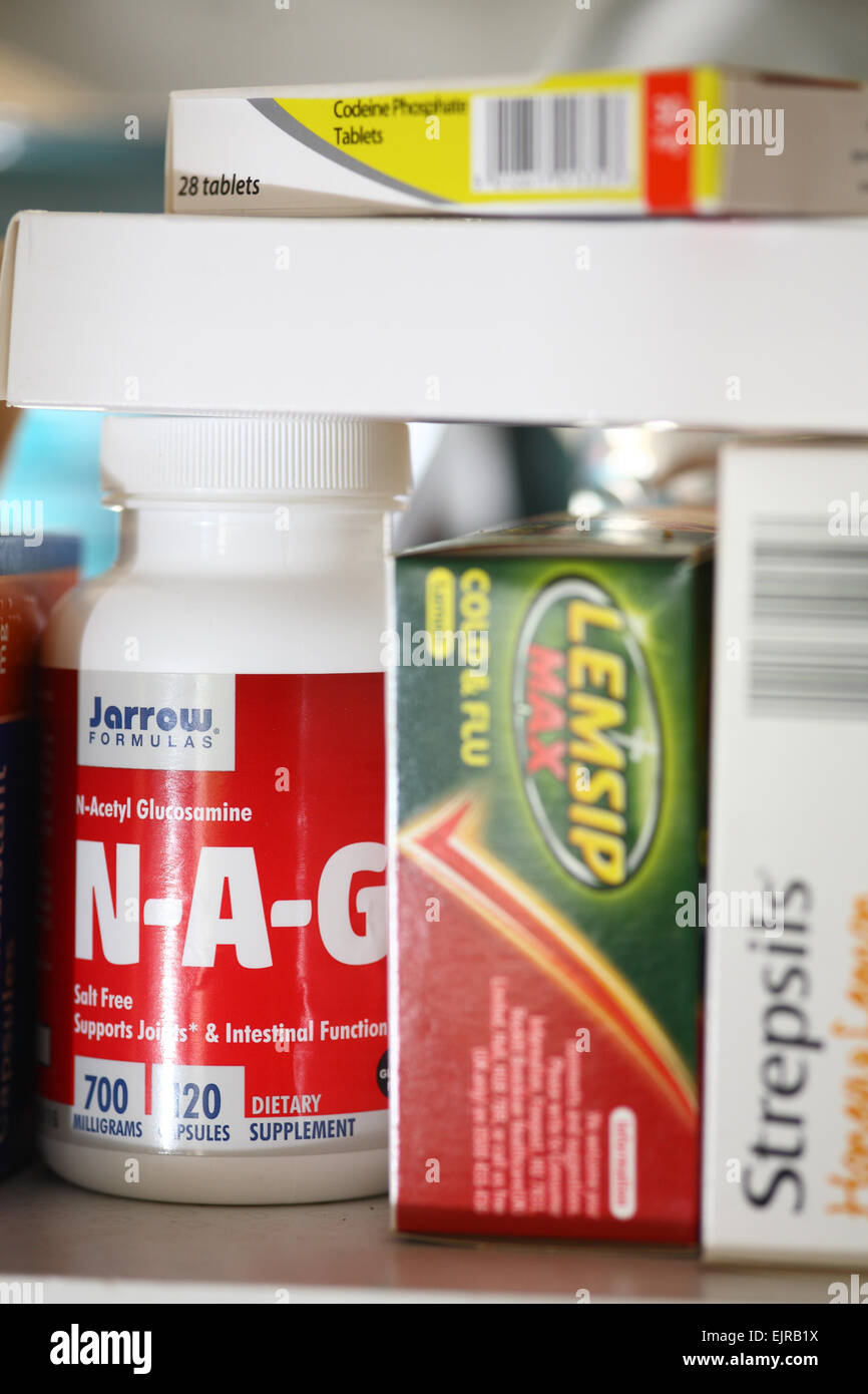assortment of drugs in domestic cupboard Stock Photo - Alamy