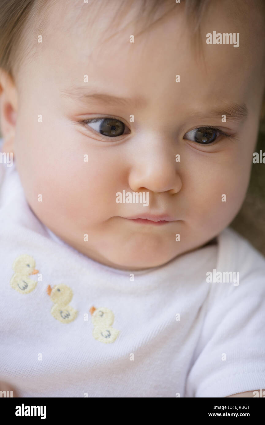 Close up of confused mixed race baby Stock Photo - Alamy