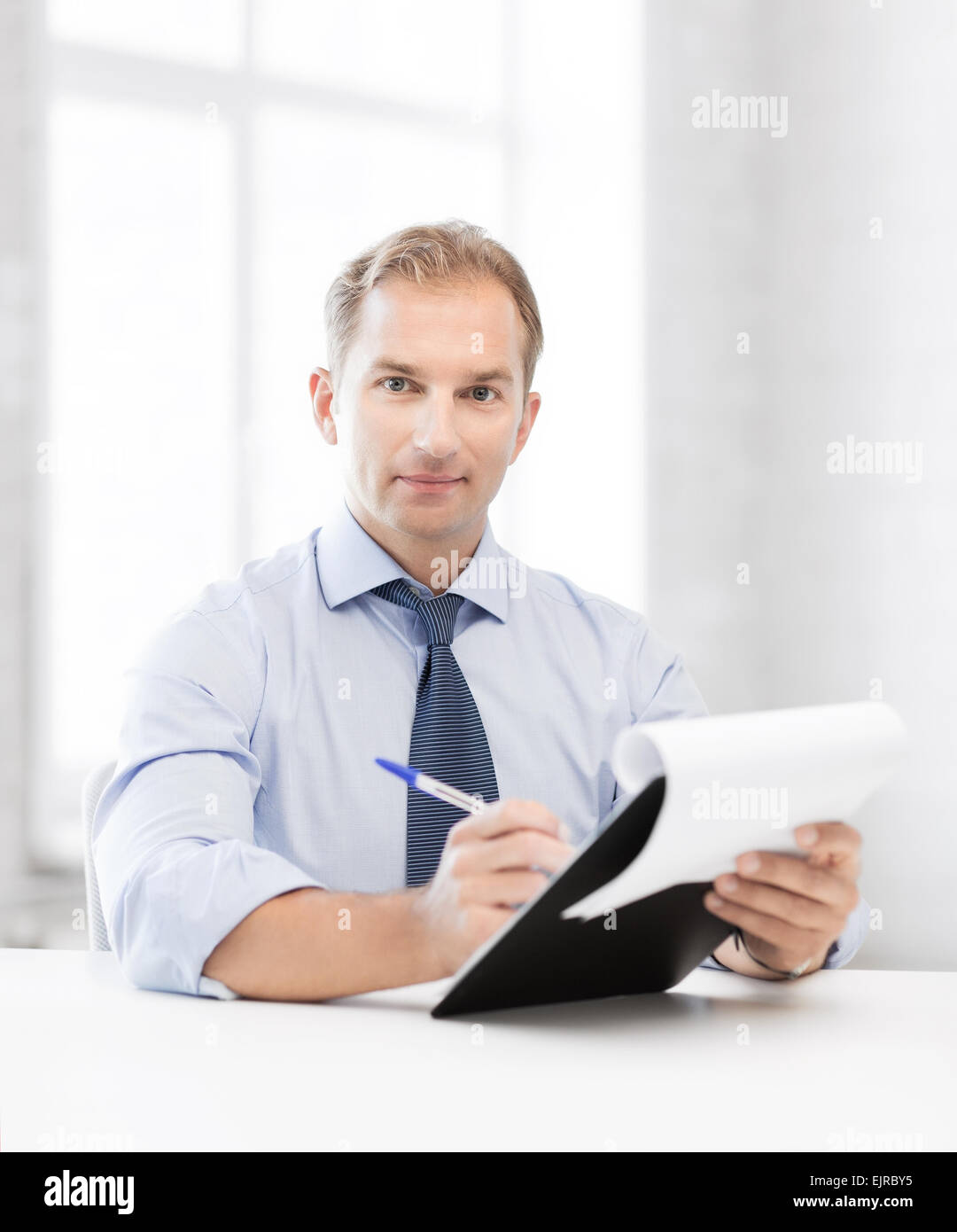 Interviewer taking notes hi-res stock photography and images - Alamy
