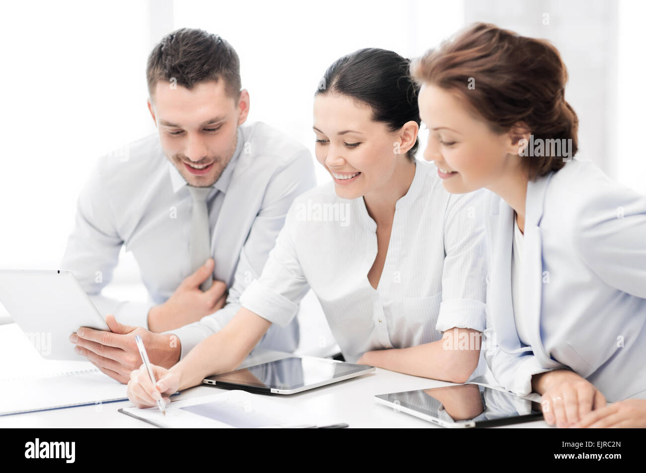 business team working with tablet pcs Stock Photo - Alamy