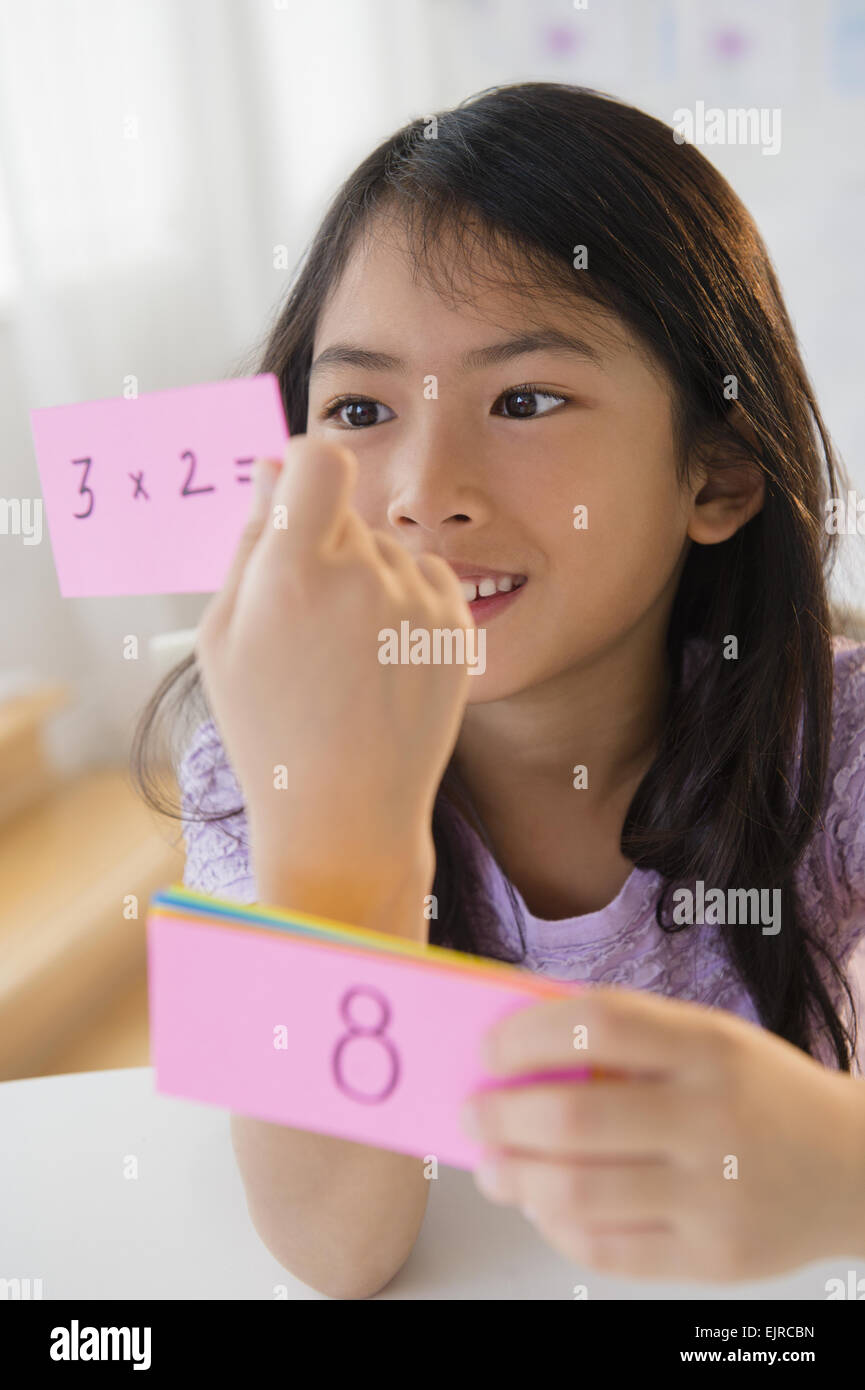 Vietnamese girl studying math with flash cards Stock Photo - Alamy