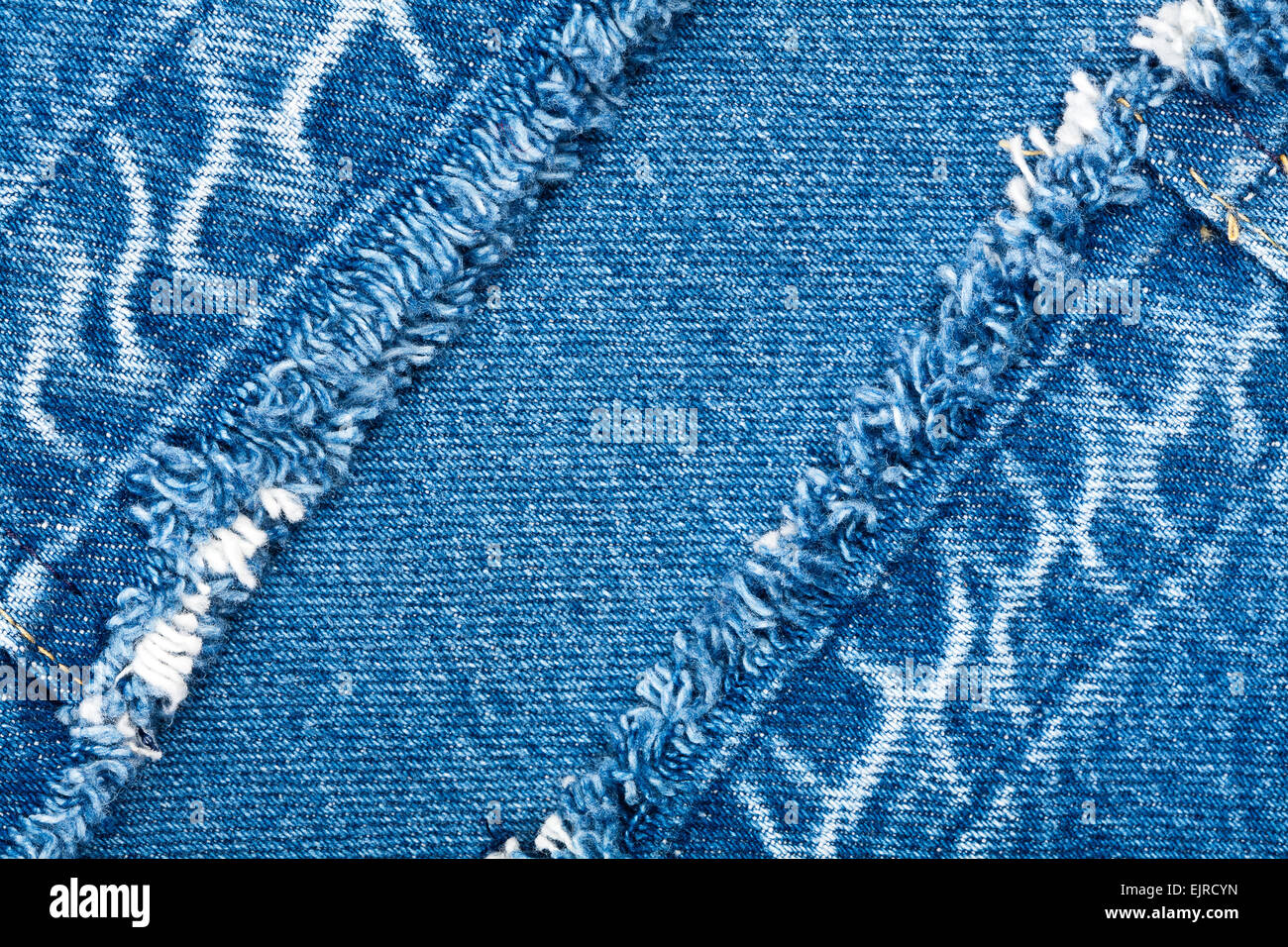 Worn blue denim jeans texture Stock Photo - Alamy
