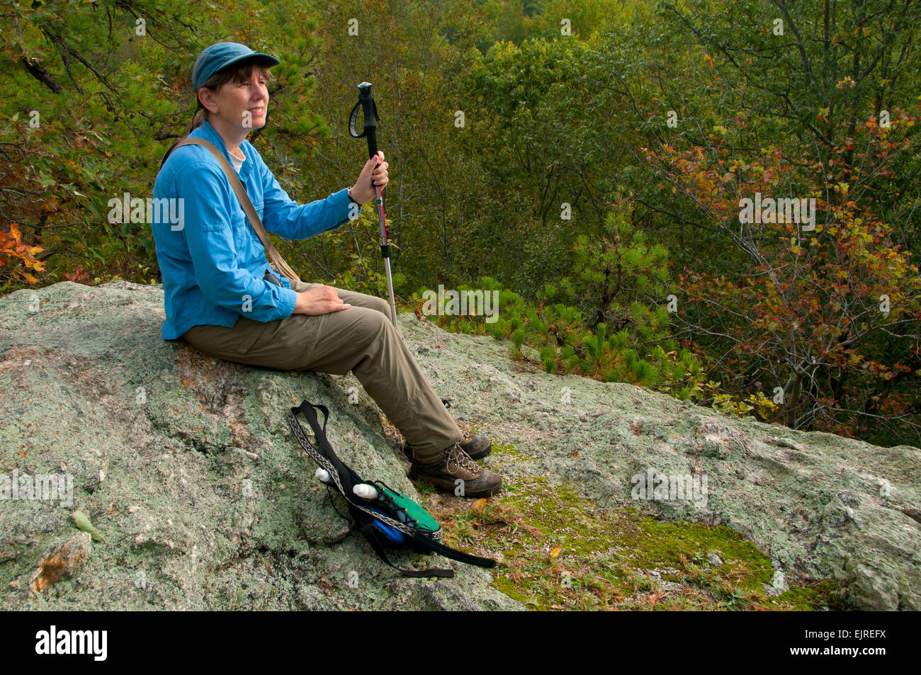 Hiker on outcrop along Mattabesett Trail, Cockaponset State Forest ...
