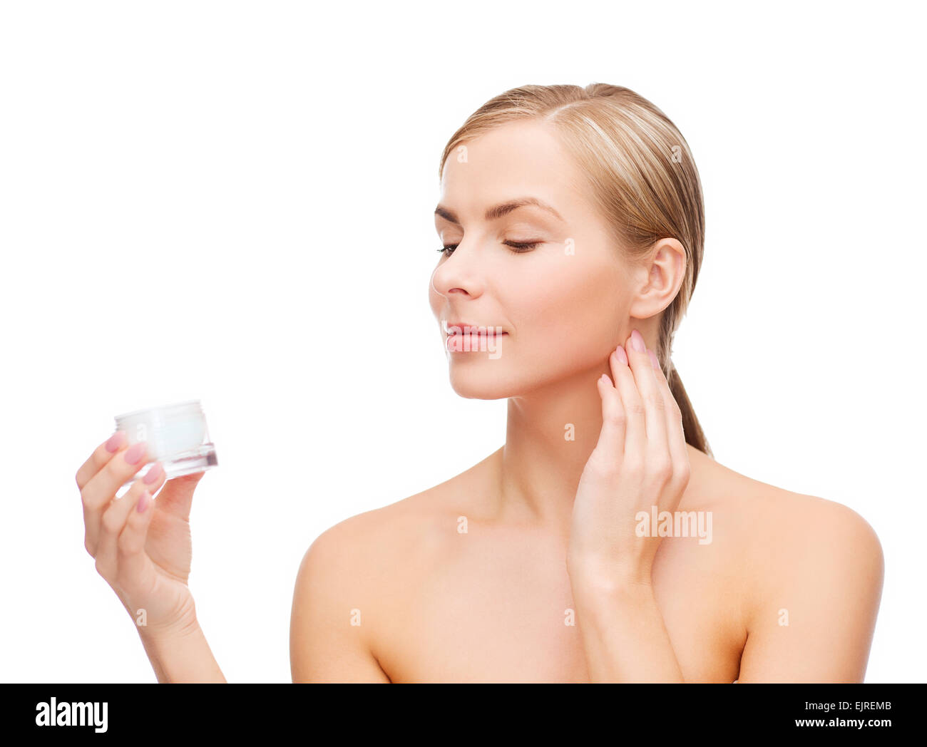 woman applying cream on her skin Stock Photo - Alamy