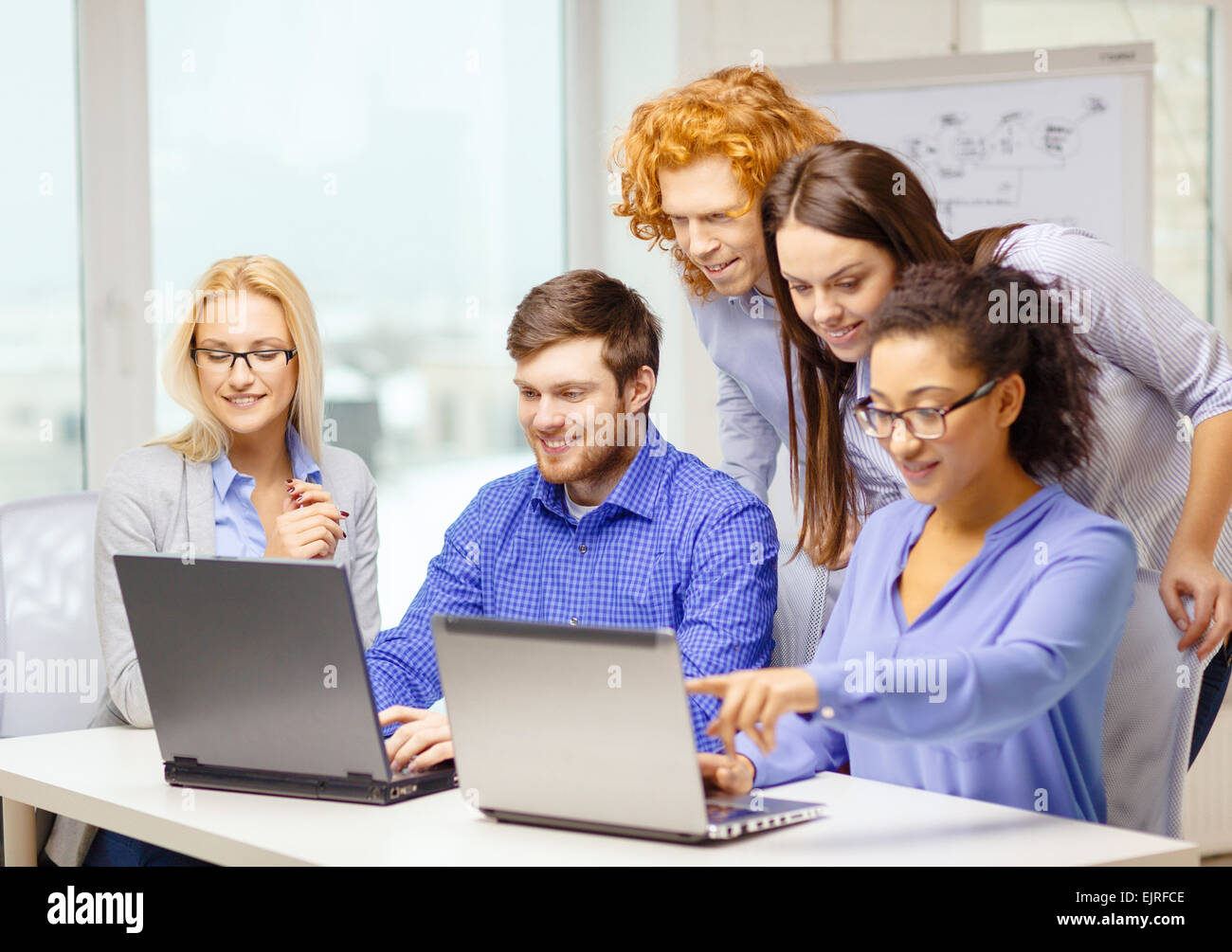 Creative international team computers hi-res stock photography and ...