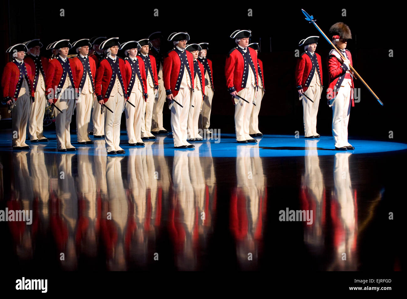 Members of the Old Guard stand in formation during a welcoming ceremony ...