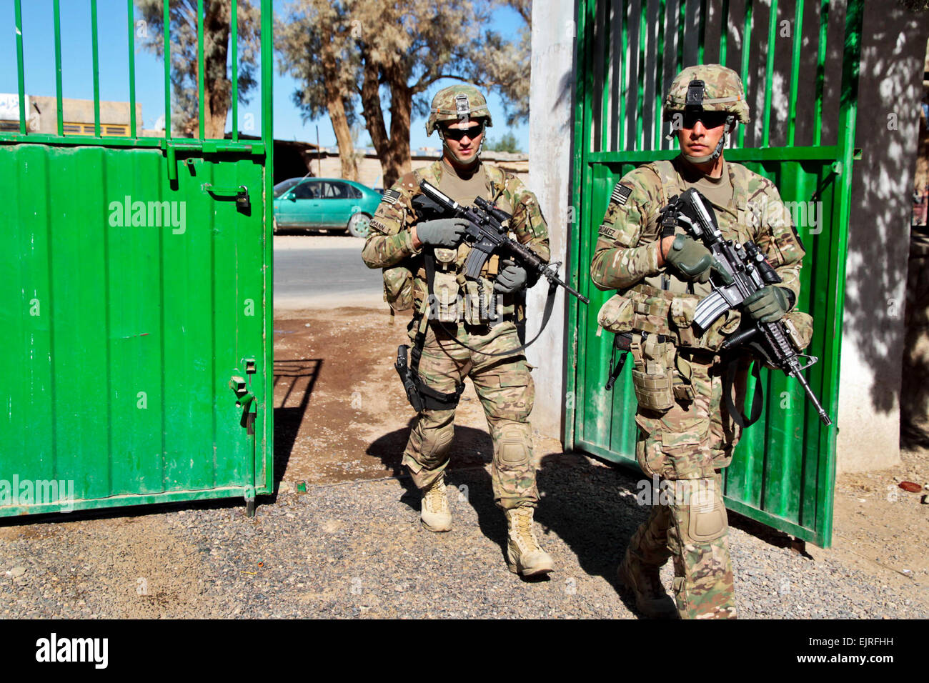 U.S. Army Spc. Joseph Gonzalez, right, and Sgt. Sean Luhmann, security ...