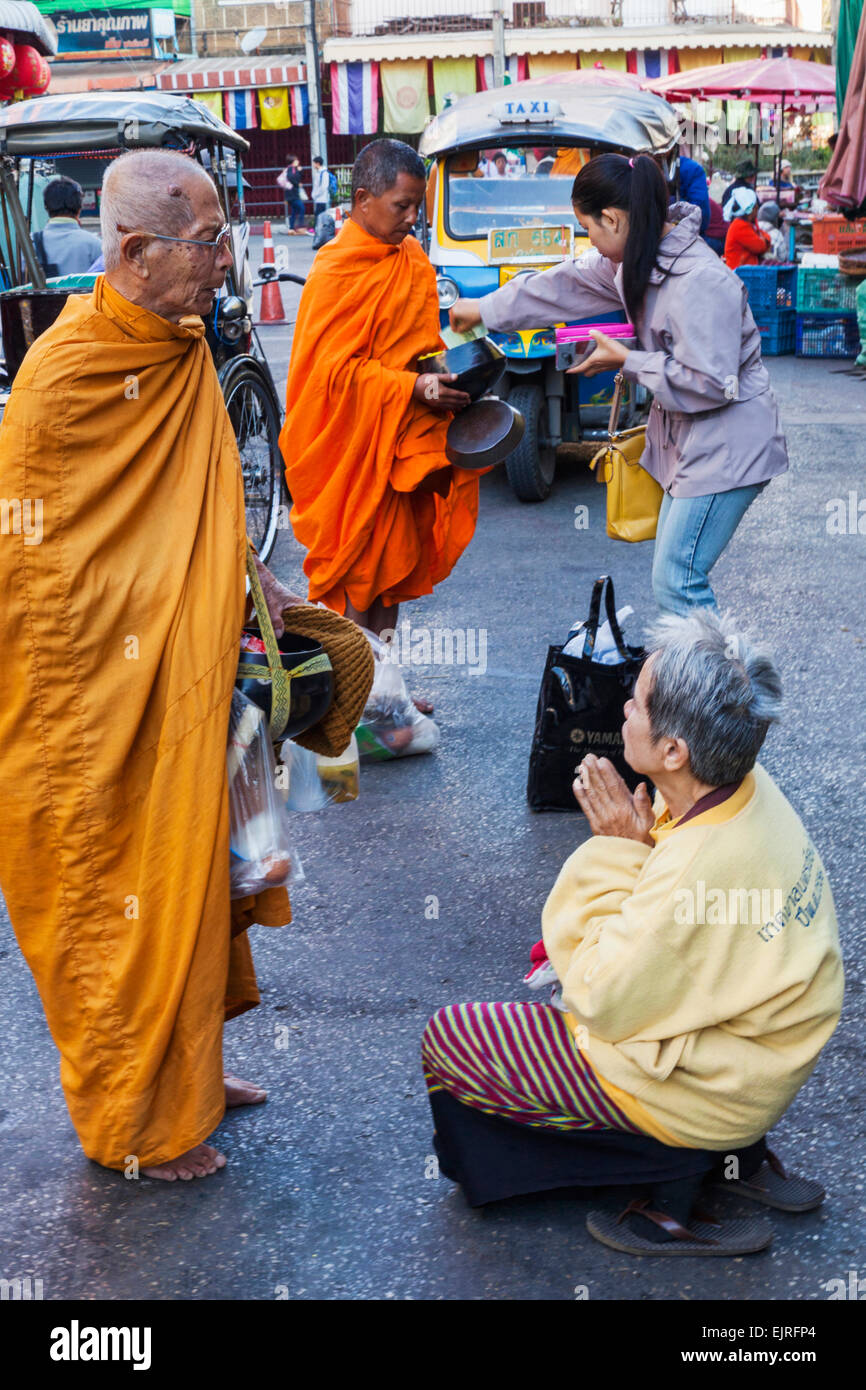 Thailand, Chiang Mai, Monks Collecting Alms Stock Photo - Alamy