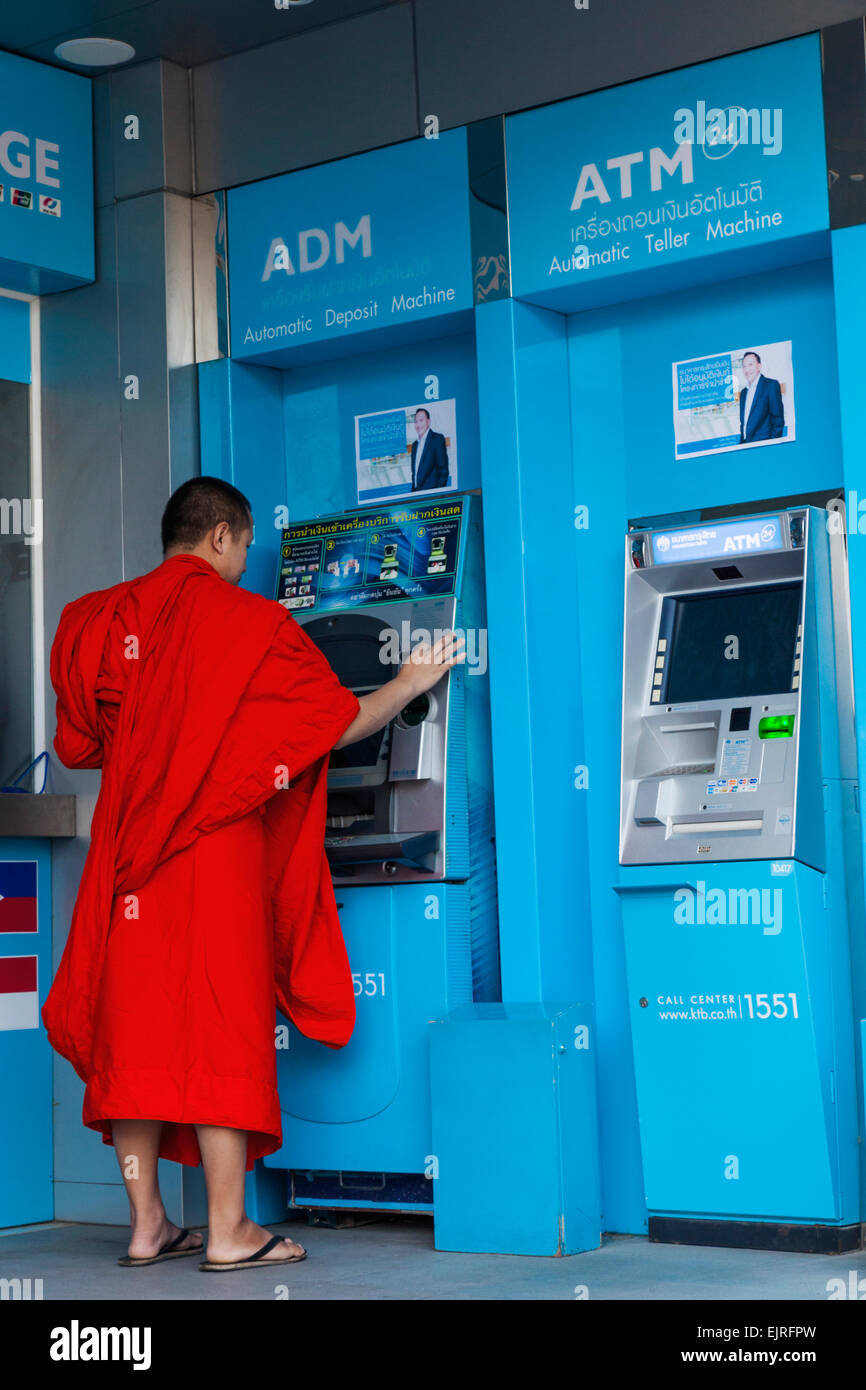 Buddhist monk at atm machine hi-res stock photography and images - Alamy