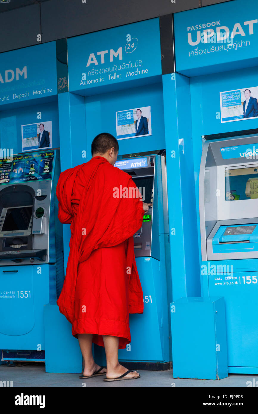Buddhist monk at atm machine hi-res stock photography and images - Alamy