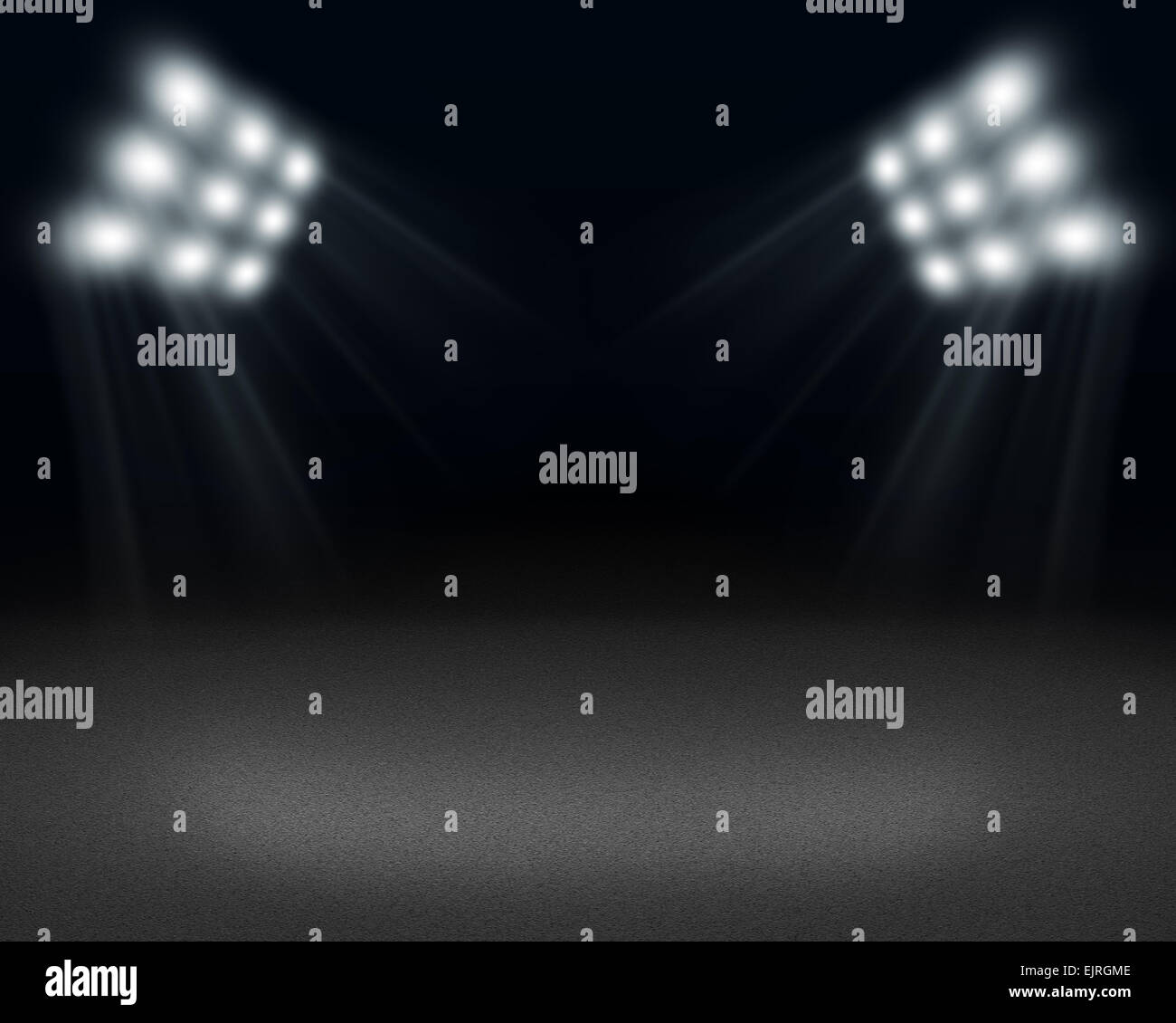 Dark room with spot of light on floor and spotlight at top Stock Photo ...