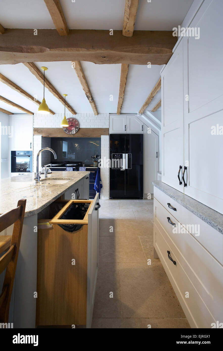 A traditional style kitchen inside a farmhouse in the UK with the ...