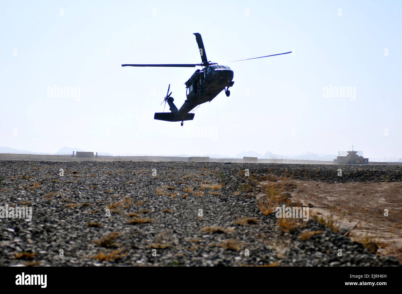 A UH-60 Black Hawk lands to drop troops on Forward Operating Base ...