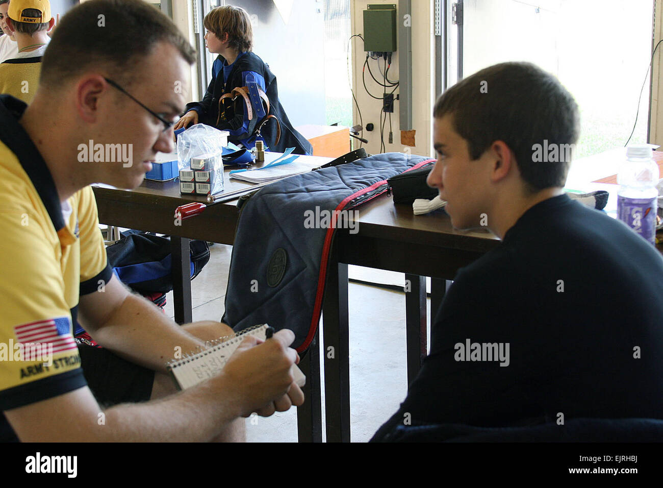 Sgt. George Norton, U.S. Army Marksmanship Unit, goes over some notes ...