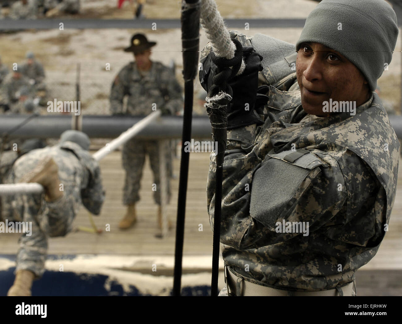 U.S. Army Pvt. Lilly Dialo completes an obstacle at Victory Tower ...