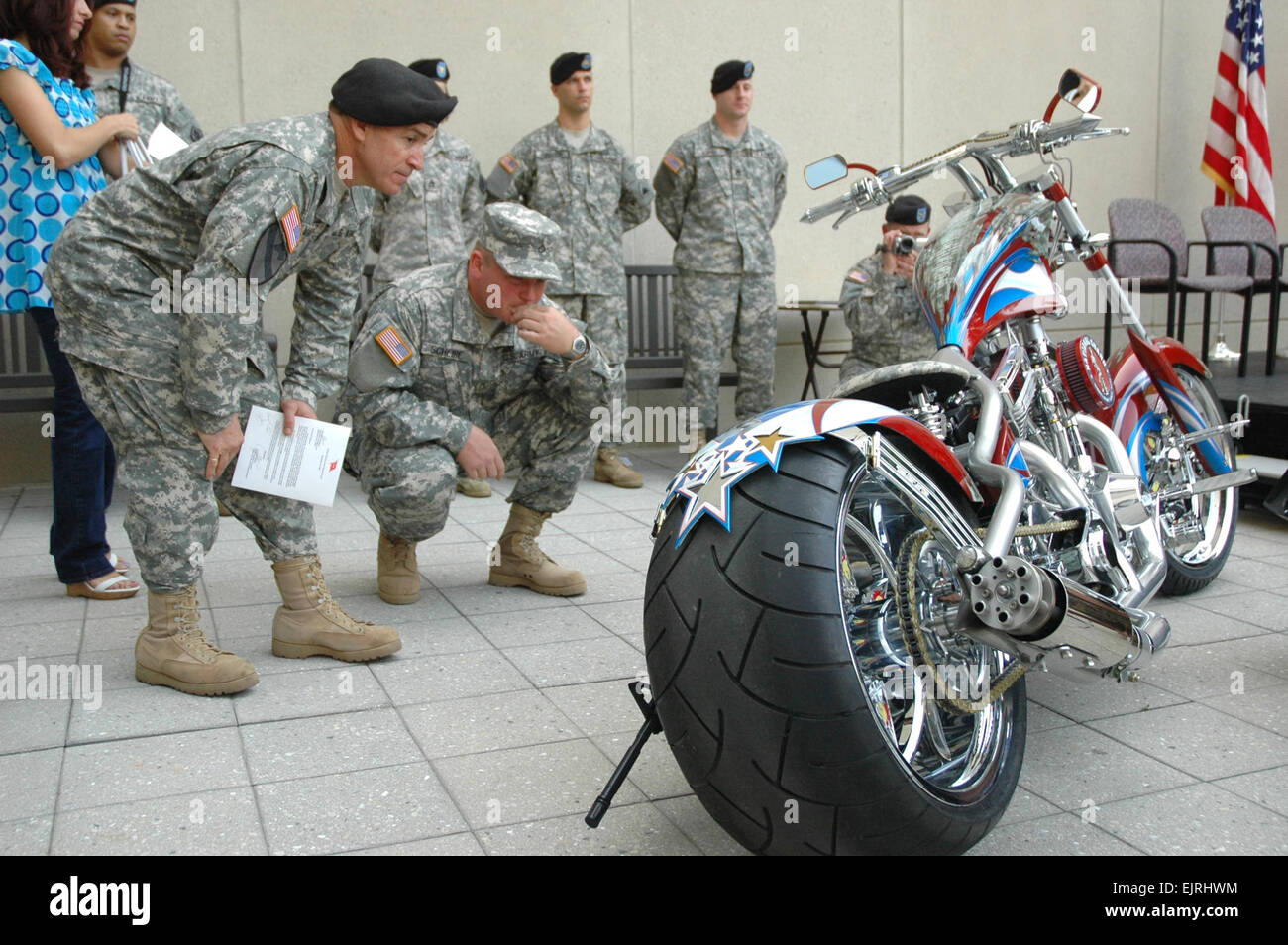 Chief Warrant Officer 3 David Vasquez and Pfc. Joseph Scheibe admire ...