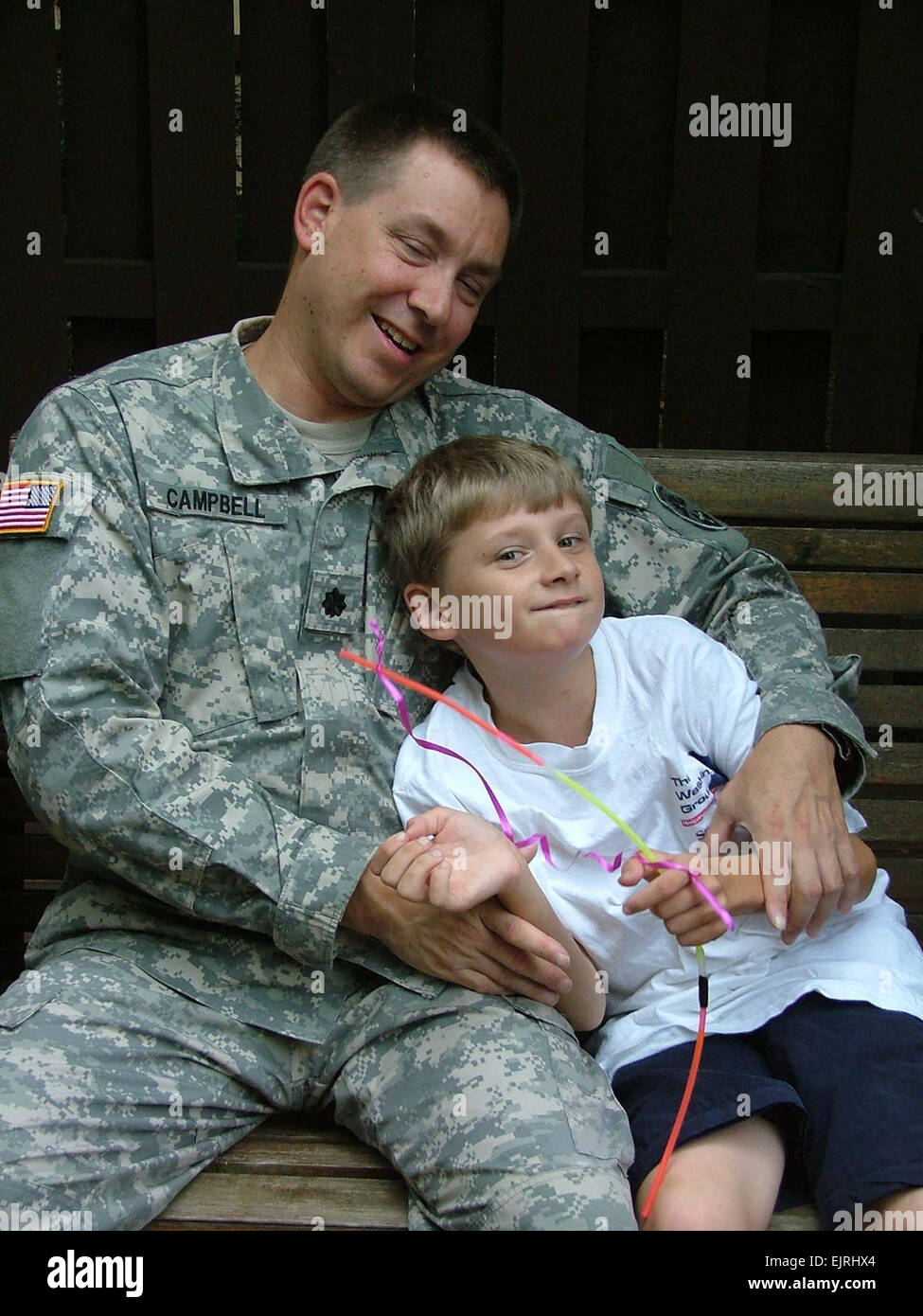 Lt. Col. Scott Campbell sits with his son, Ian. After struggling to get ...