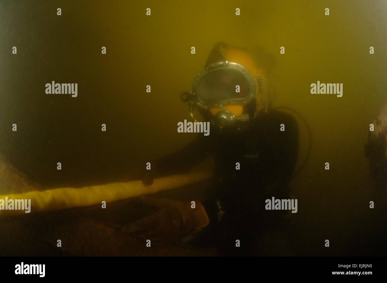 U.S. Army Spc. Benjamin Lane, a diver with the 86th Engineering Team ...