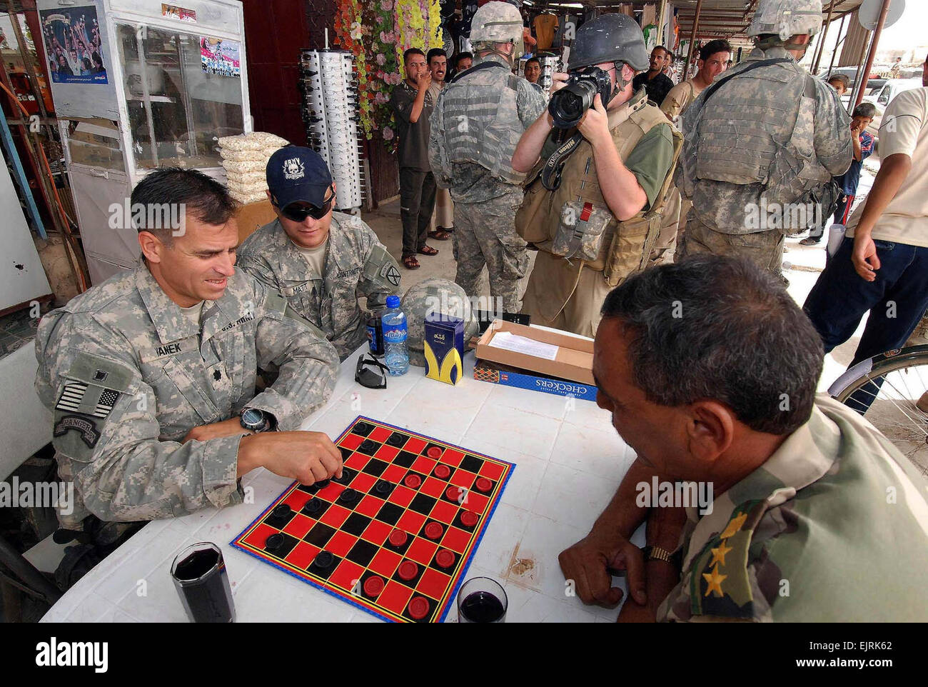 Stars and Stripes reporter James Warden photographs a game of checkers ...