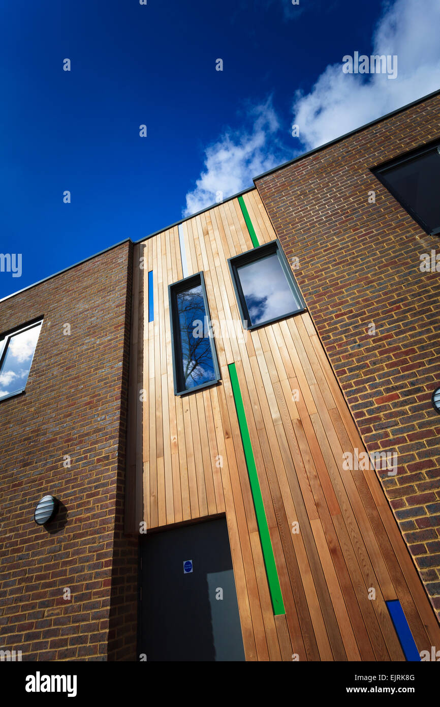 Modern timber clad college building Stock Photo - Alamy