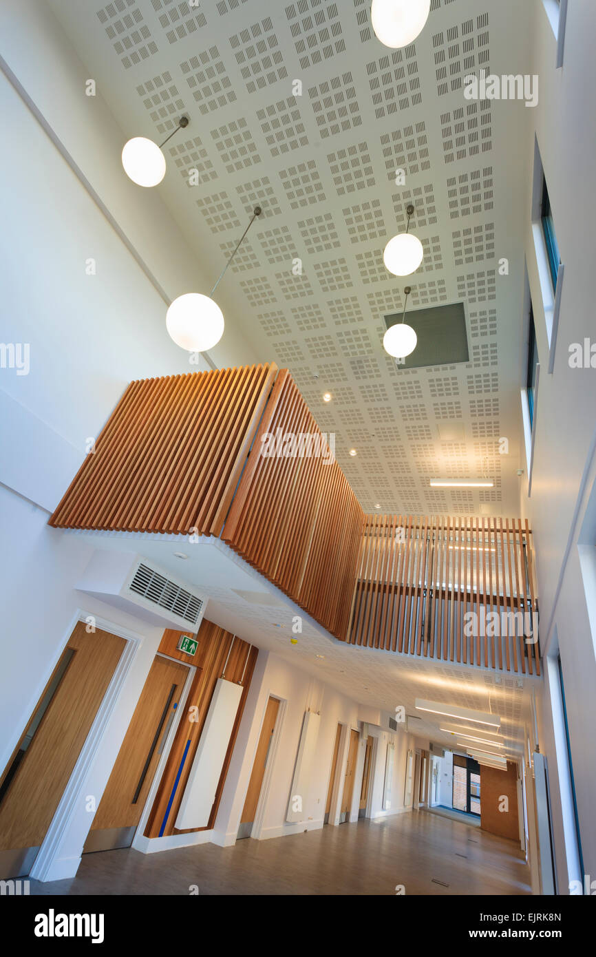 Timber balcony above main communal area of modern college building ...