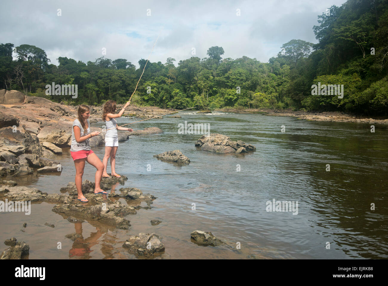 Fishing in the upper Coppename River, Central Suriname Nature Reserve ...