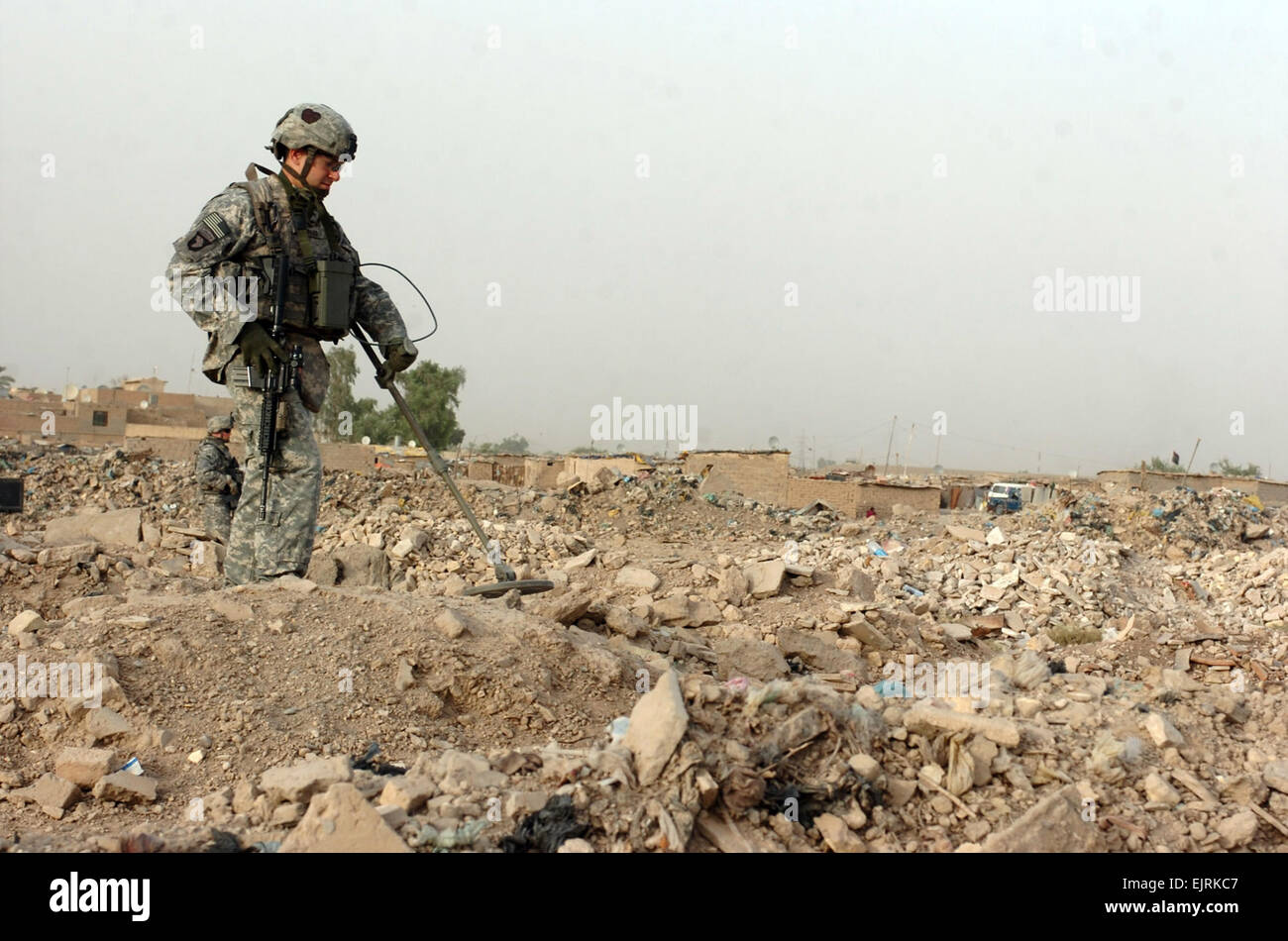 Sgt. Victor Faggiano, a native of Manchester, N.H., patrols through a ...