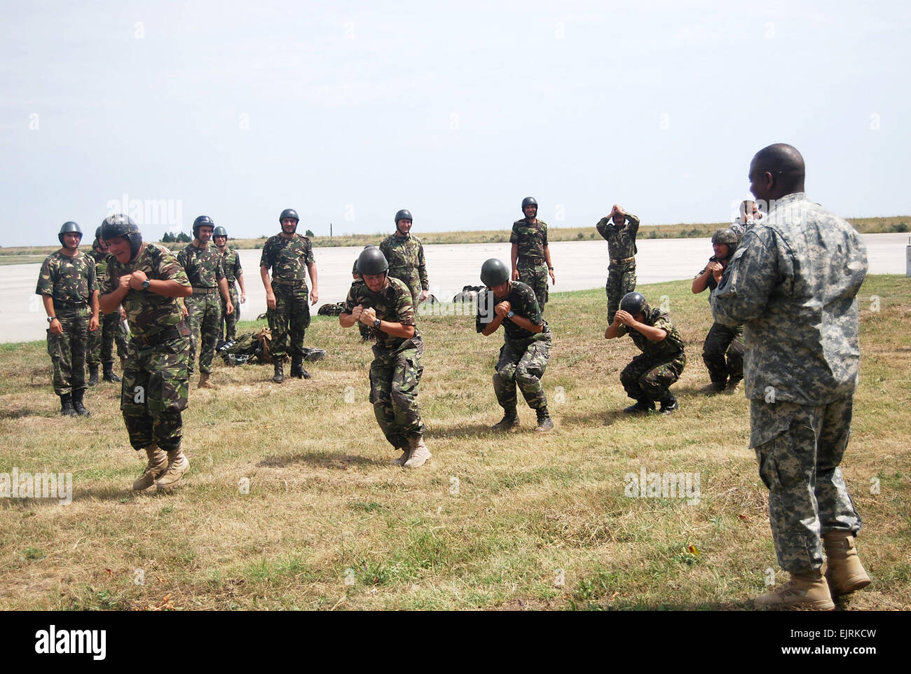 Sgt. 1st Class Elijah Acklin of the 5th Quartermaster Company right ...