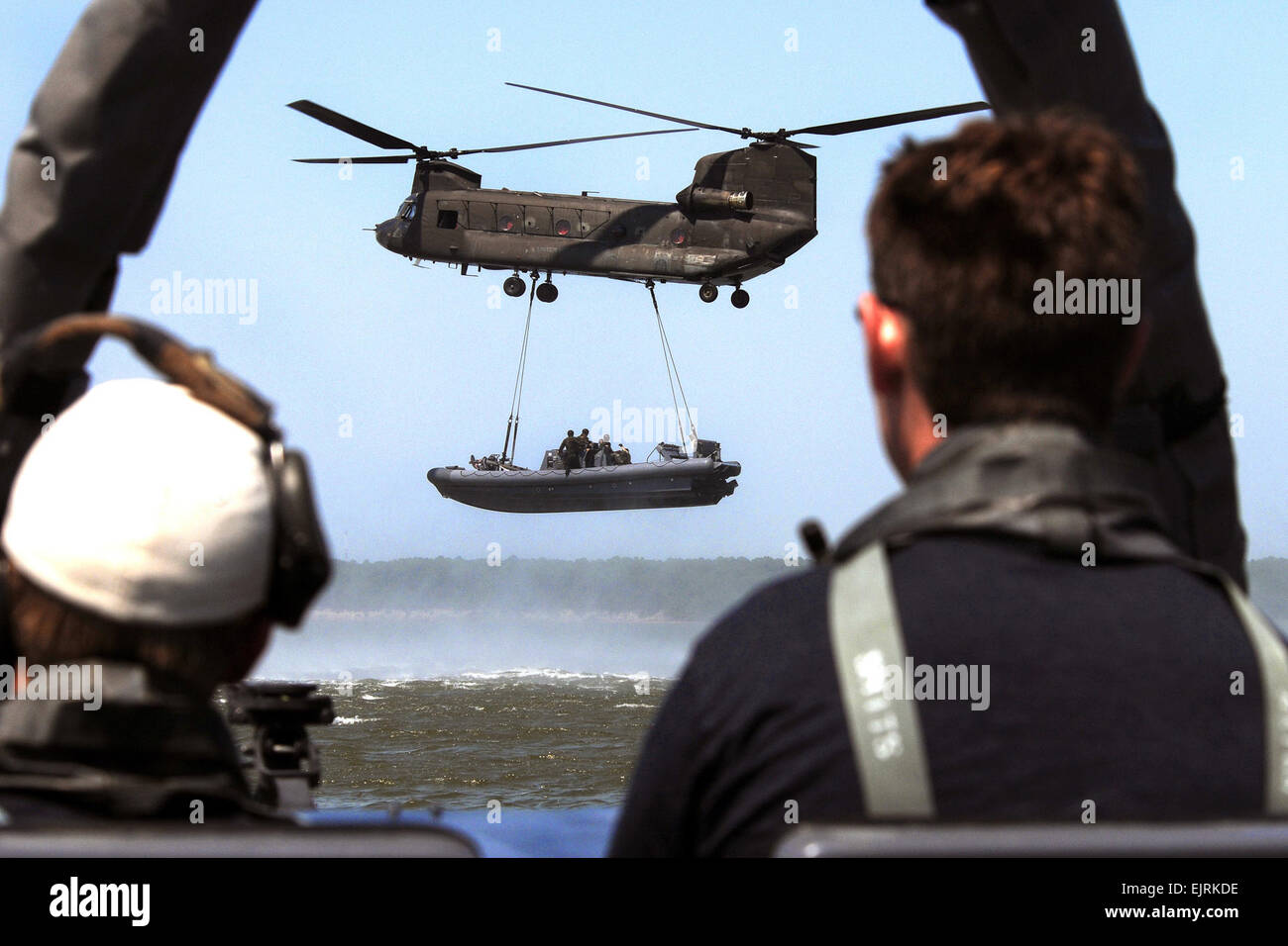 U.S. Navy Special Warfare Combatant-craft Crewmen SWCC on board a rigid ...