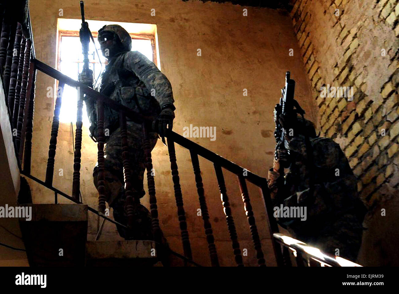 Spc. Michael Stutz inspects the top exterior of his newly assigned M ...
