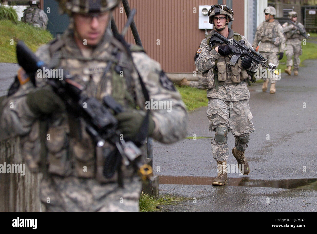 Soldiers from 3rd Platoon 1-23 Inf. conduct operations at a water ...