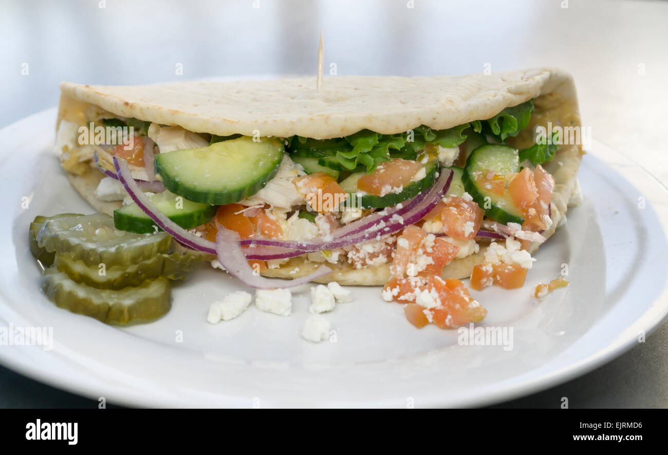 Greek pitta chicken salad lunch Stock Photo - Alamy