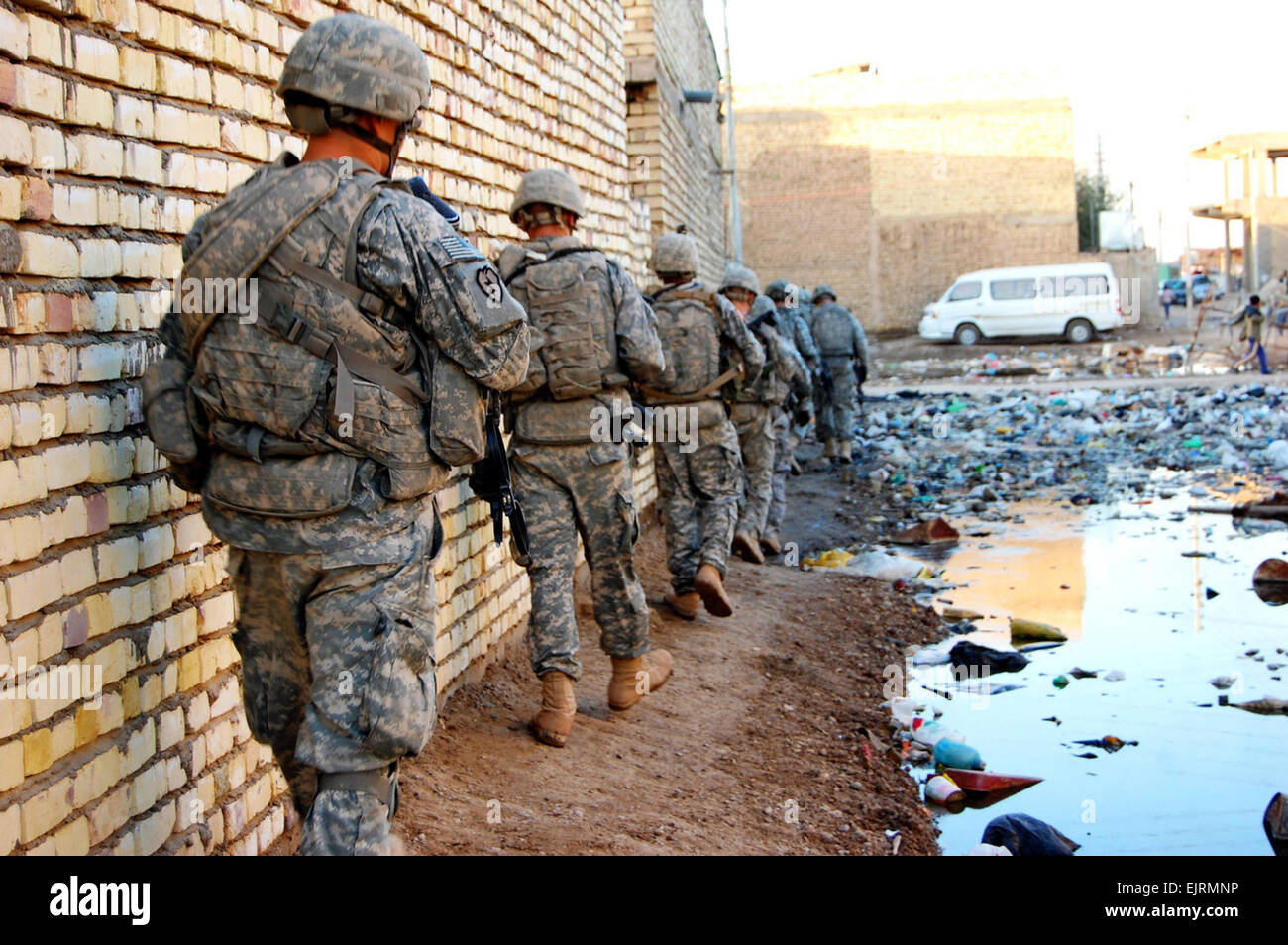 Soldiers from Company A, 1st Battalion, 27th Infantry Regiment “Wolfhounds,” 2nd Stryker Brigade ...