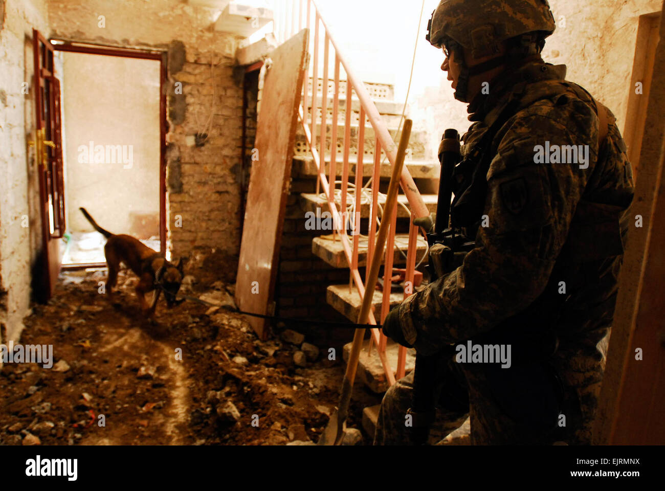 FORWARD OPERATING BASE FALCON, Iraq ó Sgt. Craig Walker, military dog ...
