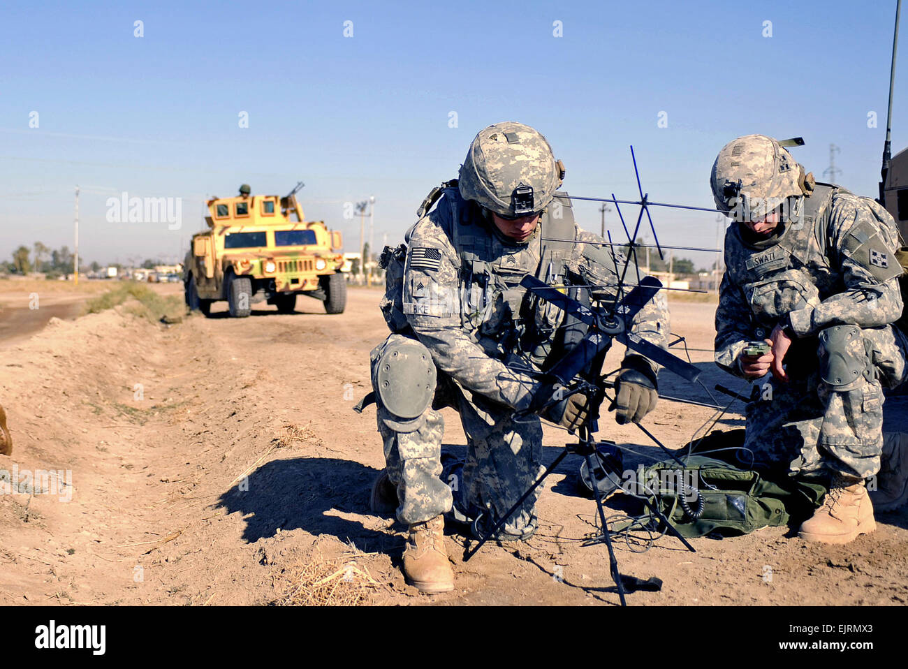 Sgt. Ryan Pike, left, and Staff Sgt. Altaf Swati setup a tactical ...