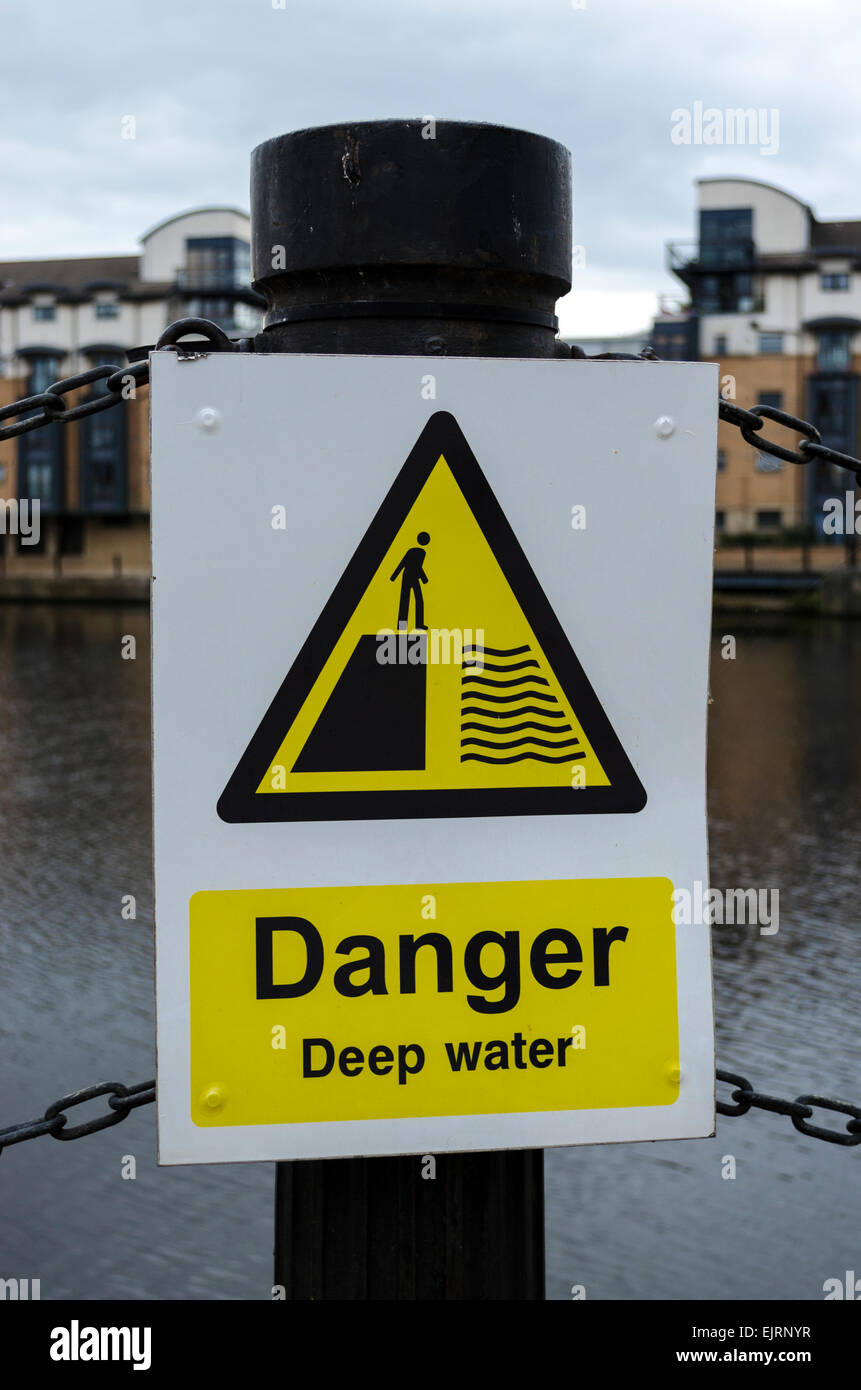 Danger deep water warning sign on a quayside Stock Photo - Alamy