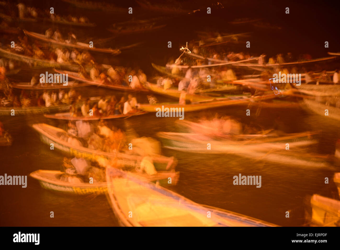 Boats of pilgrims on the Ganges River Stock Photo - Alamy