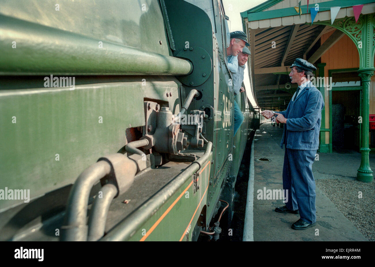 Steam train driving instructor Clive Groom (moustache) with trainees ...
