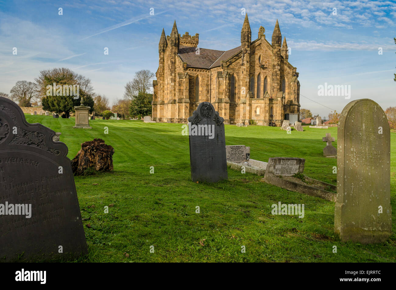 Typical British church with a graveyard Stock Photo - Alamy